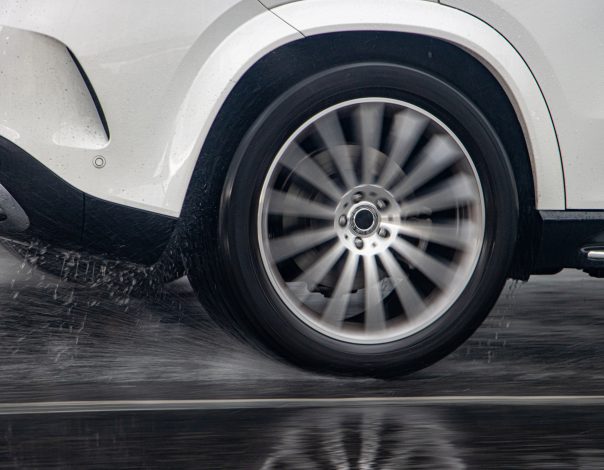 Detailed driver wheel of the car spinning the tire